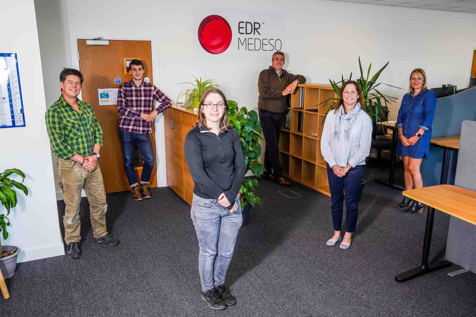 team-photo-in-the-office - AMP Technology Centre